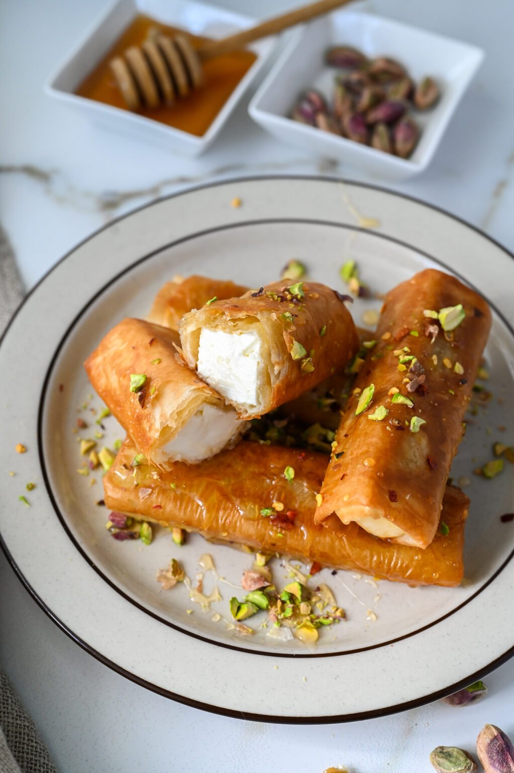 Flaming Greek cheese saganaki, flambeed fried cheese - Mia Kouppa