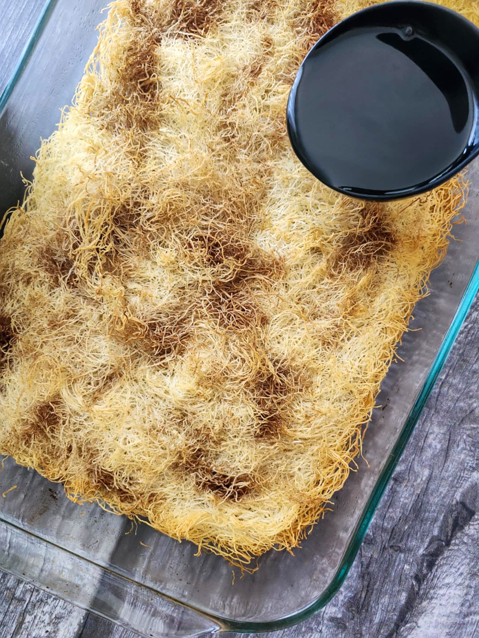 Greek ekmek kataifi with apple - Custard and whipped topping dessert ...