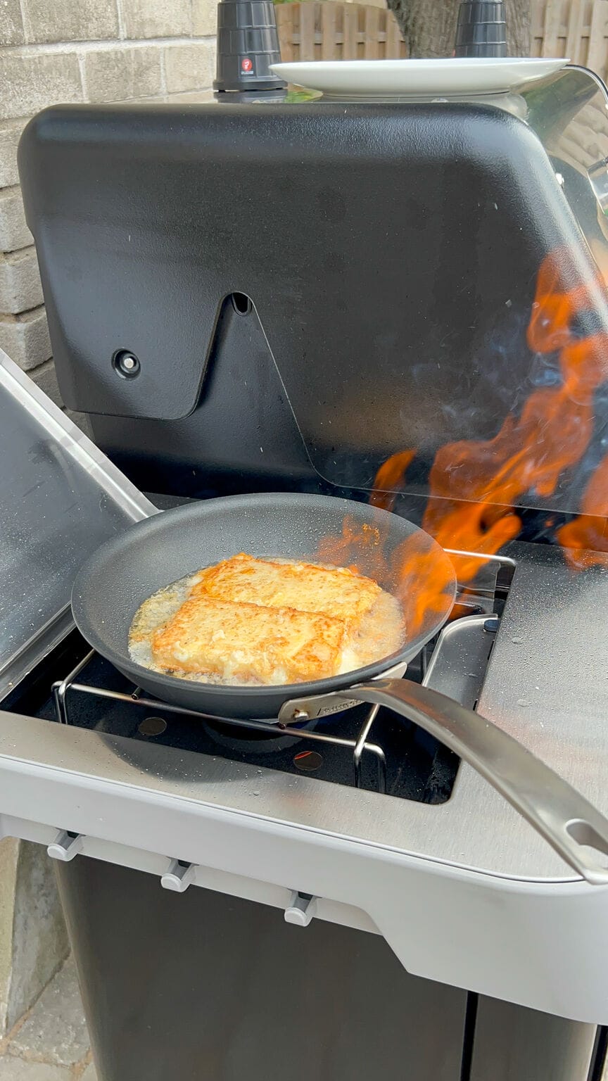 Flaming Greek cheese saganaki, flambeed fried cheese - Mia Kouppa