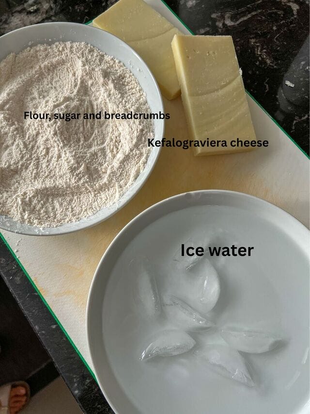 Flaming Greek cheese saganaki, flambeed fried cheese - Mia Kouppa